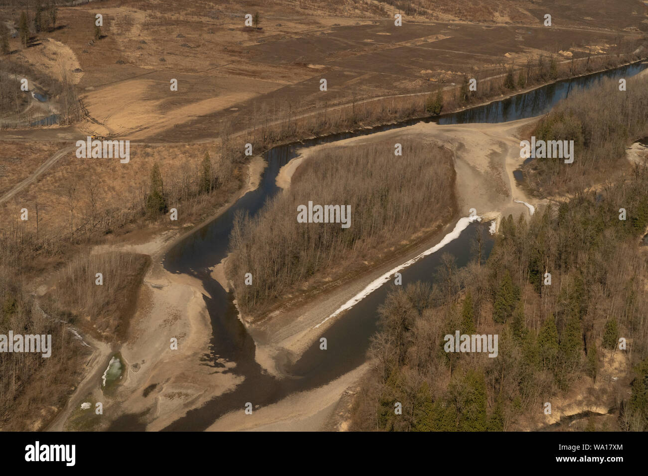 Aerial view of a side channel of the Fraser river during the summer ...