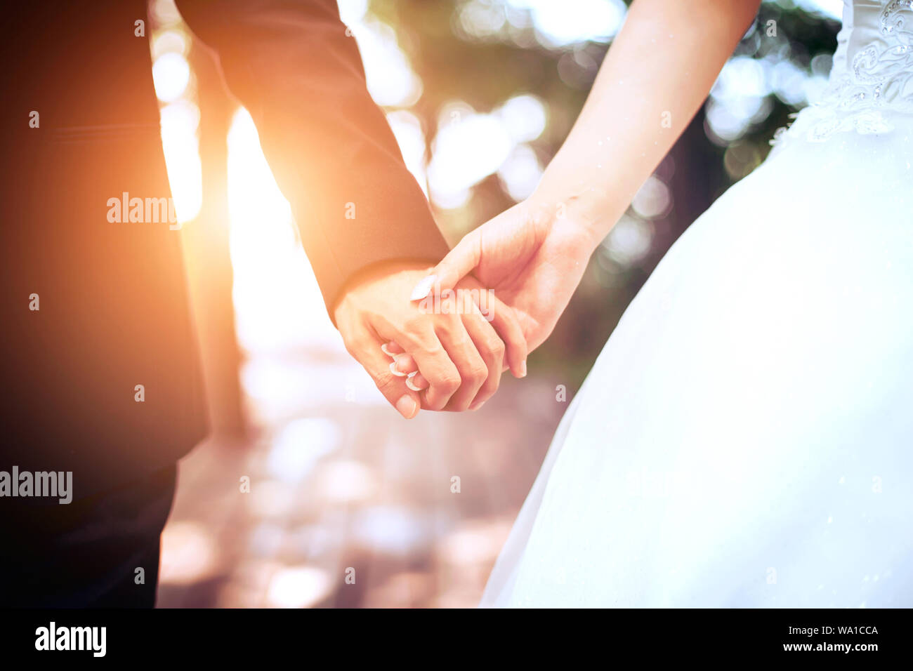 Hand in hand Stock Photo - Alamy