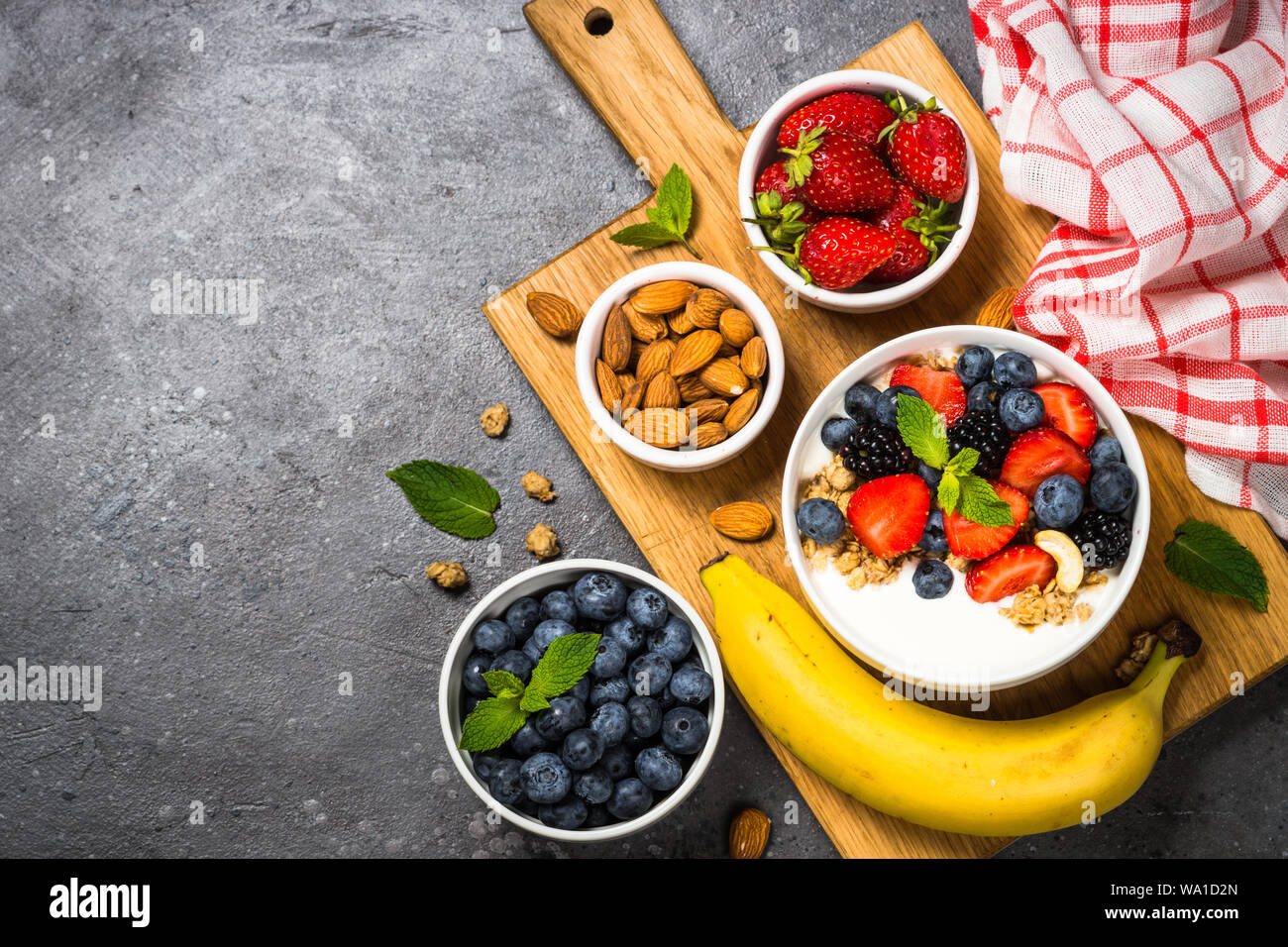 Greek yogurt granola with fresh berries Stock Photo - Alamy
