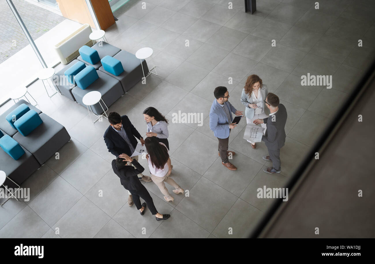 Group of business people collaborating in office Stock Photo - Alamy