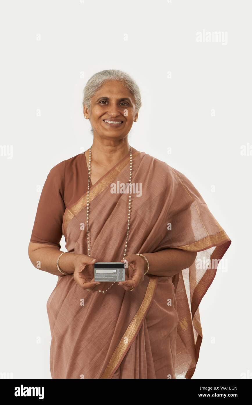 Old woman hand holding card hi-res stock photography and images - Alamy