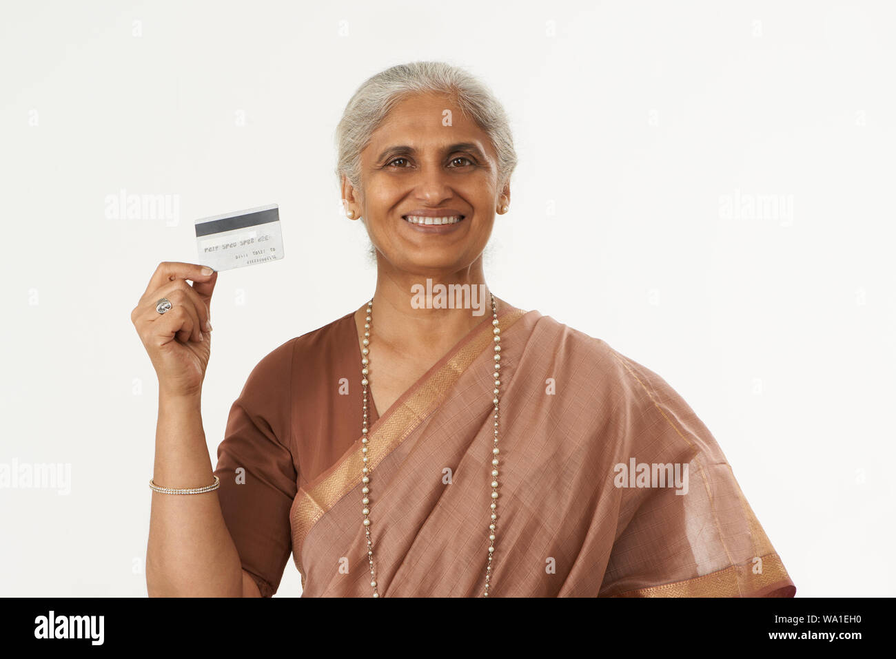 Old woman hand holding card hi-res stock photography and images - Alamy