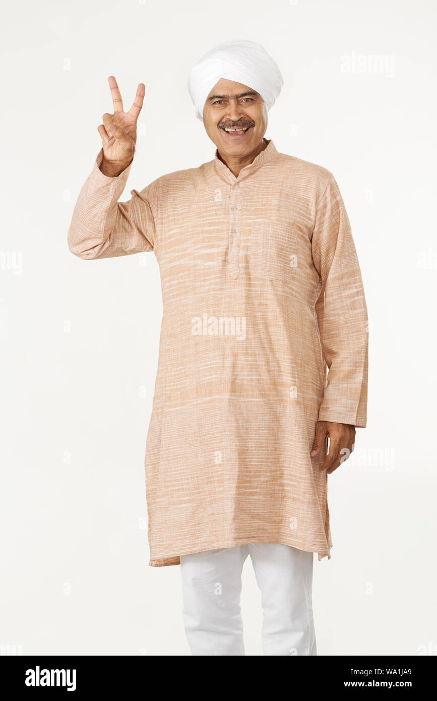 Man with v sign hi-res stock photography and images - Alamy