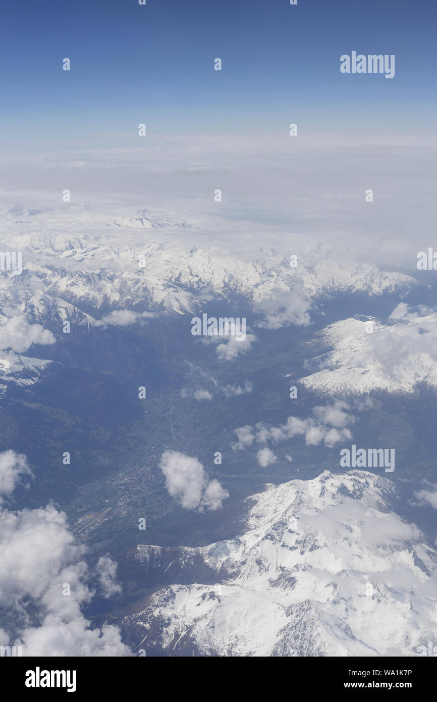 Aerial of the Alps from a commercial airplane Stock Photo - Alamy