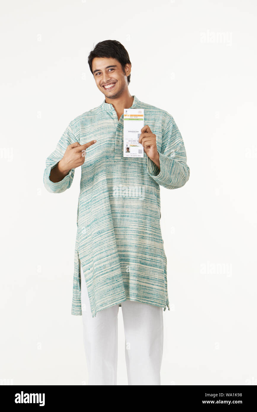 Rural man showing an Aadhar card Stock Photo - Alamy