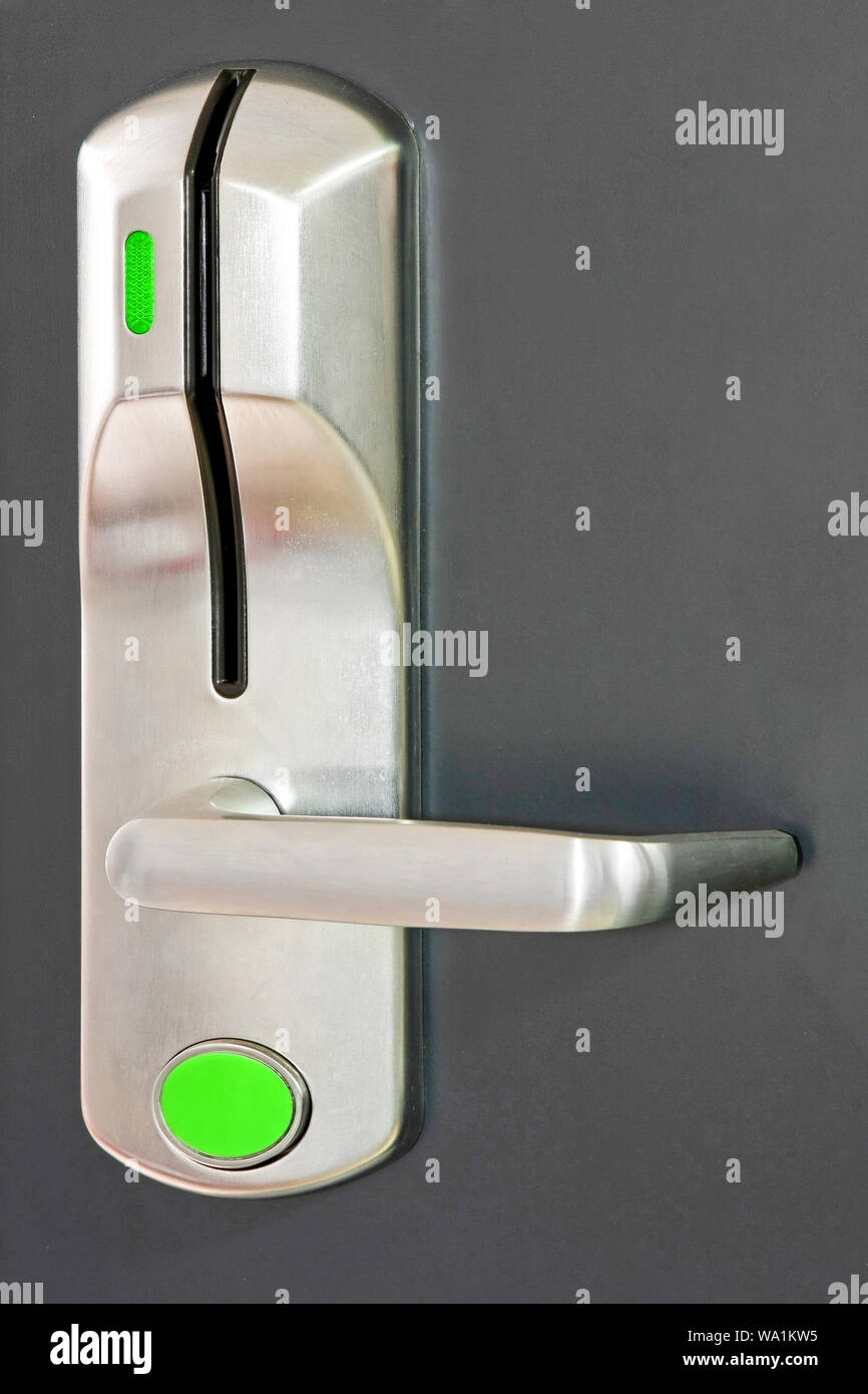 Green light at electronic card lock door Stock Photo - Alamy