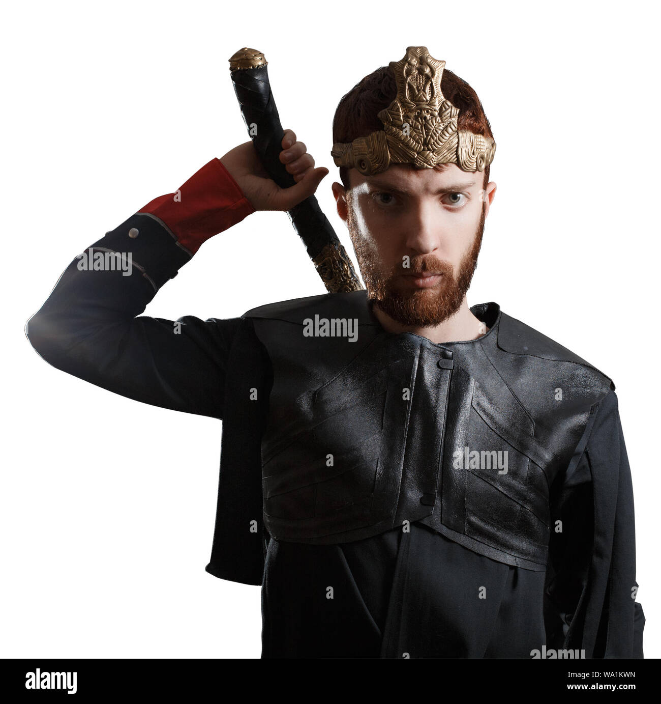 Ginger man knight with sword in his hand behind his back and a crown at ...
