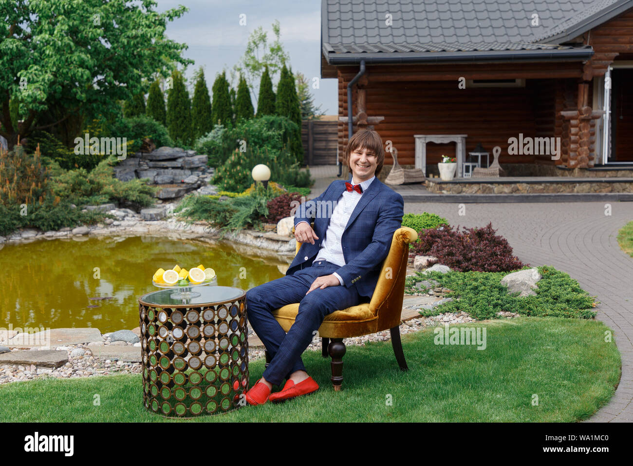 Man in wedding suit at table hi-res stock photography and images - Alamy