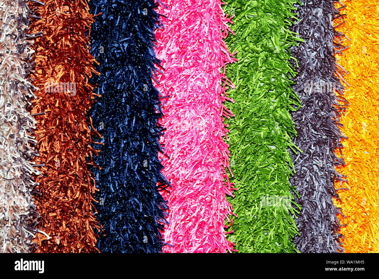 Color samples of shaggy wool carpet rolls Stock Photo - Alamy