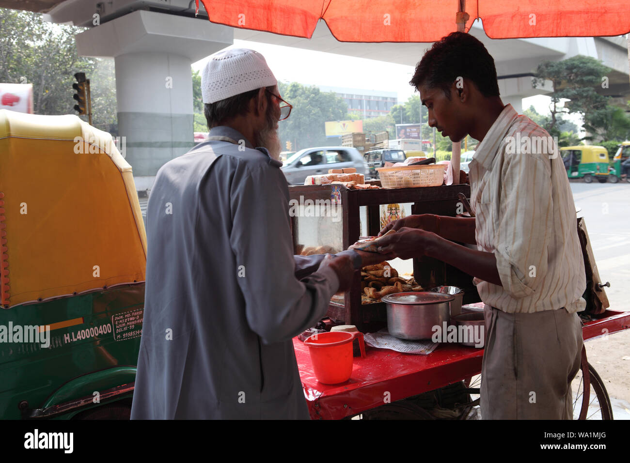 Shopkeeper selling customer hi-res stock photography and images - Alamy