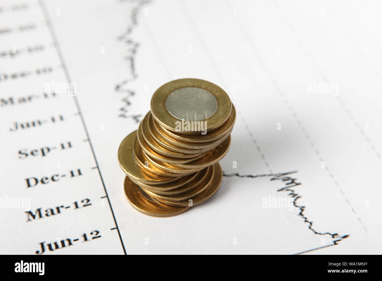 Line graph coins representing hi-res stock photography and images - Alamy