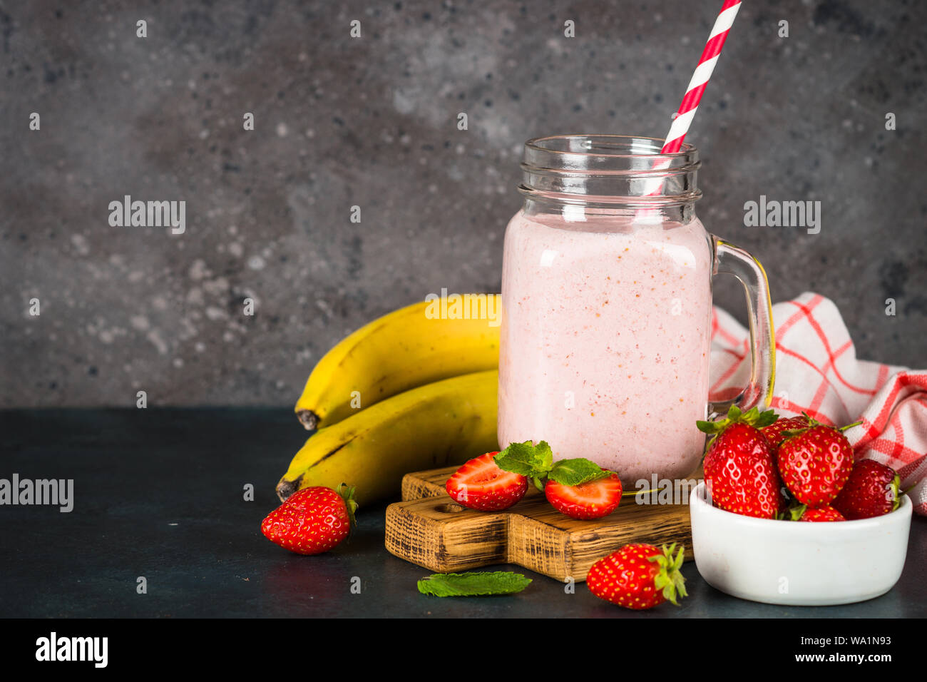 Strawberry milkshake or smoothie in mason jar Stock Photo - Alamy