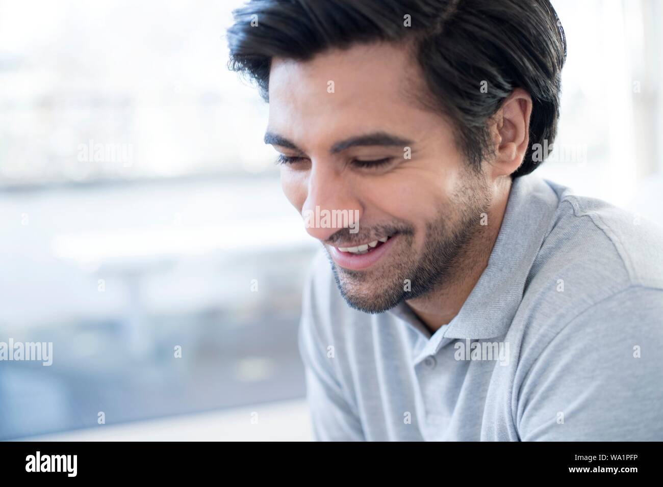 Portrait adult man smiling hi-res stock photography and images - Alamy