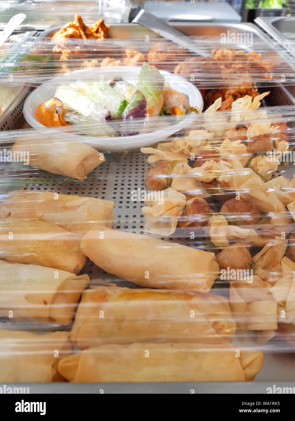 Vegetable fried spring rolls in festival street food Stock Photo - Alamy