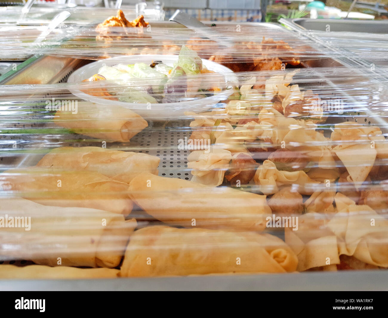 Vegetable fried spring rolls in festival street food Stock Photo - Alamy