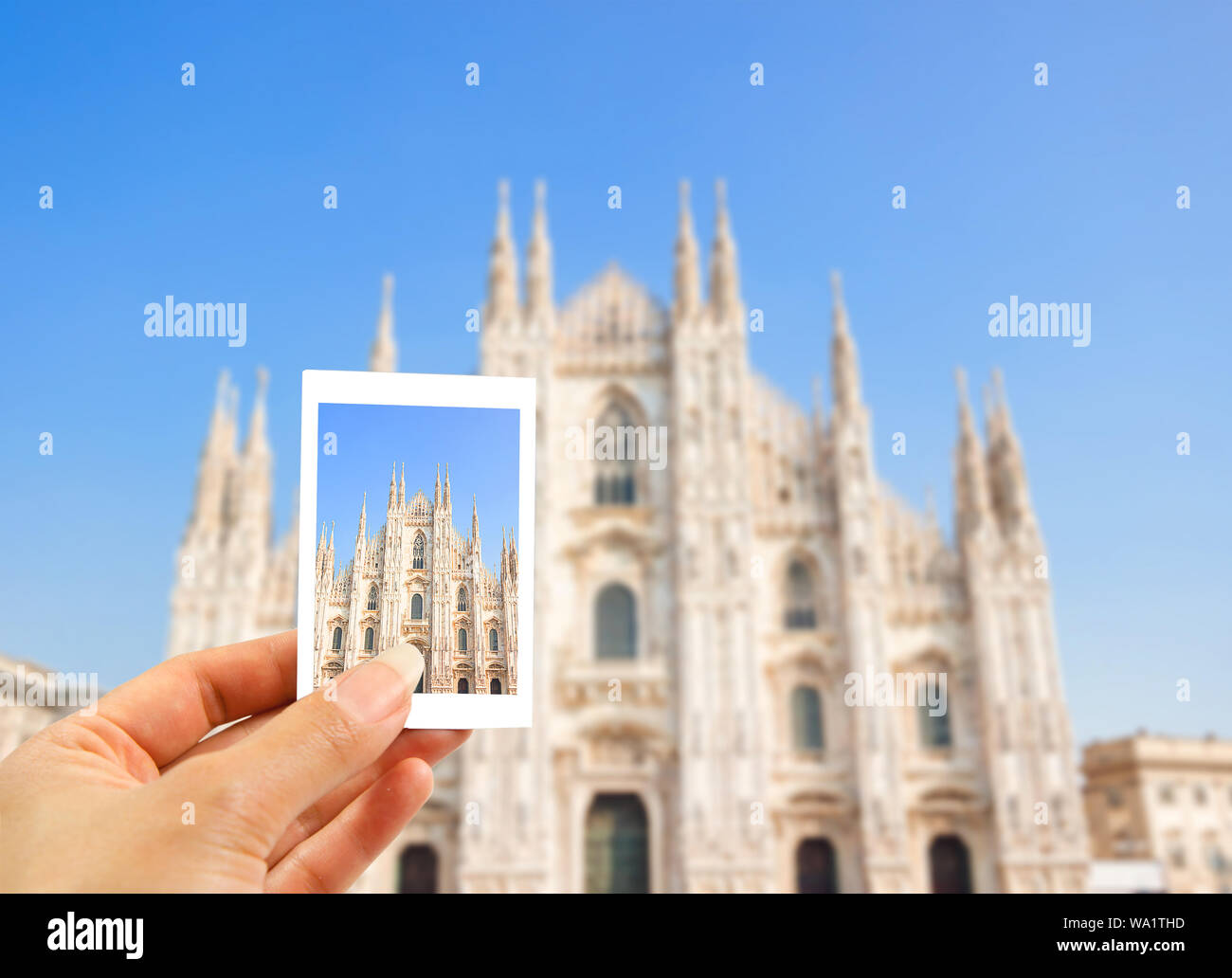 Hand holding Instant photo in Europe Milan Cathedral, Duomo di Milano ...