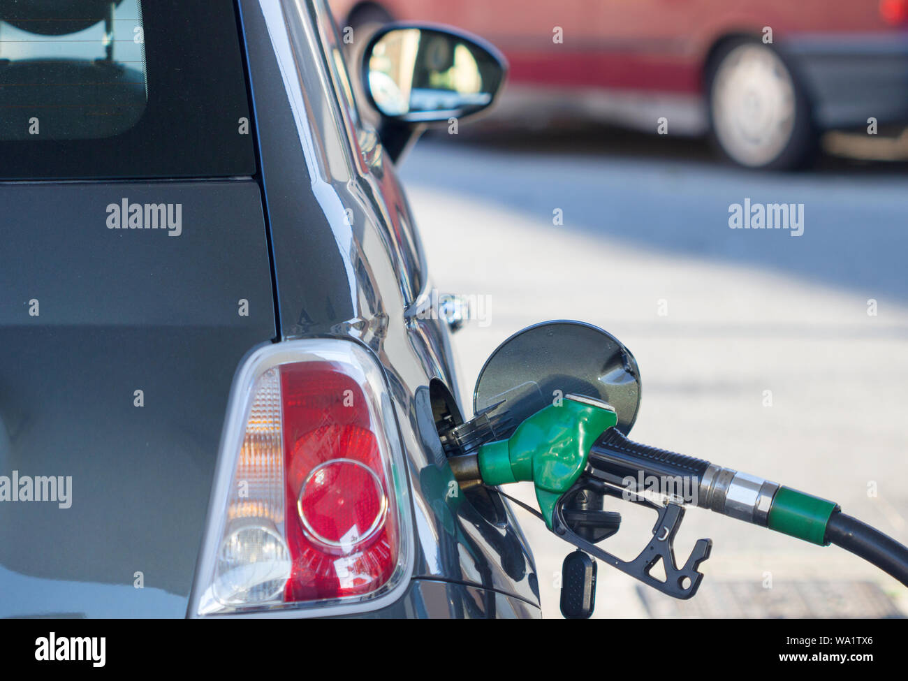 fill up with petrol in pumping gas, pumping fuel nozzle gasoline fuel ...