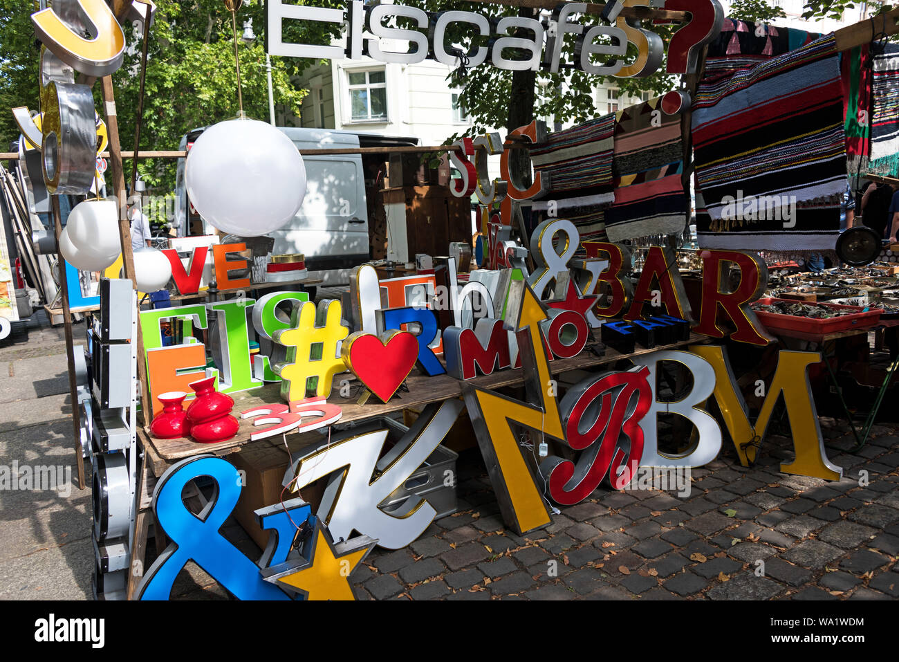 Stall specializing in vintage signs, Arkonaplatz flea market, Berlin ...