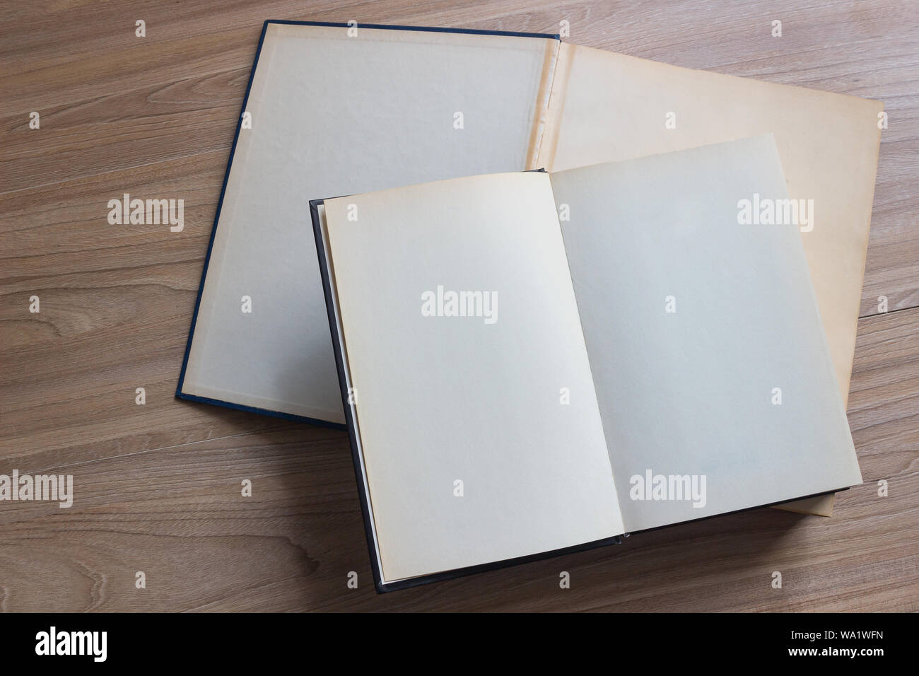 Open book, vintage book open on wooden table background with copy space ...