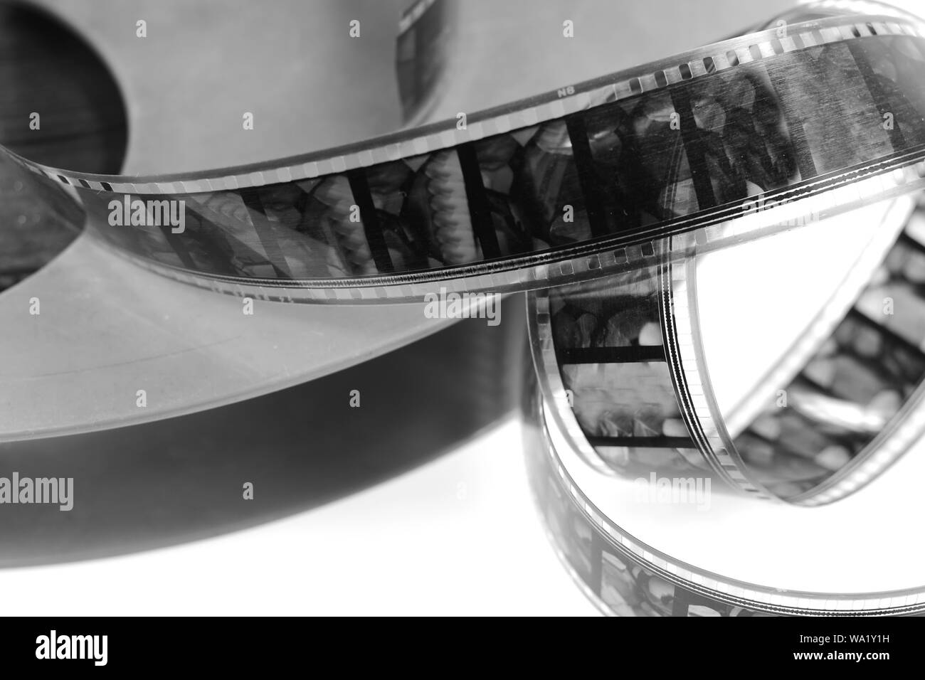 Old cine-film. Film strip on a blur background. Black and white photo ...