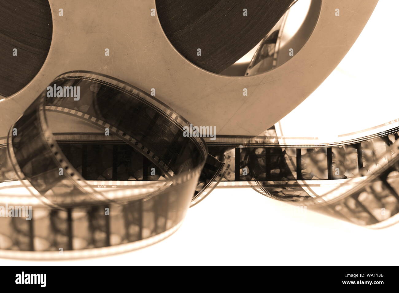 Old cine-film. Film strip on a blur background. Sepia photo Stock Photo ...