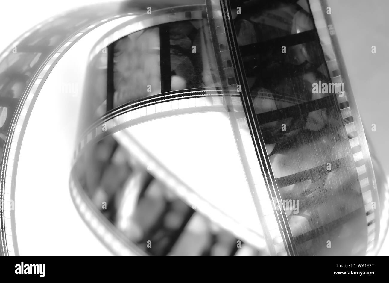 Old cine-film. Film strip on a blur background. Black and white photo ...
