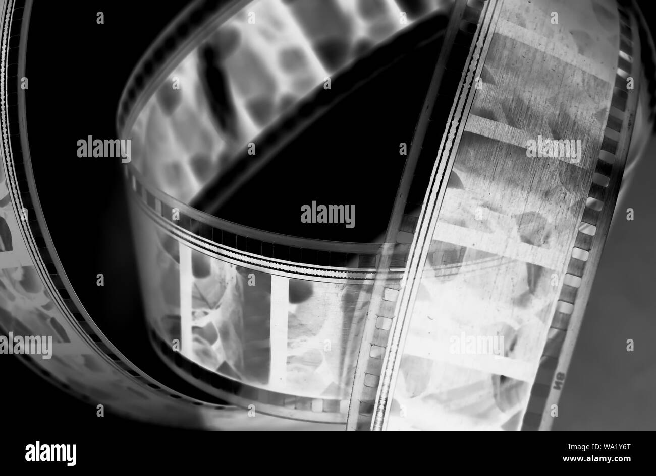 Old cine-film. Film strip on a blur background. Black and white photo ...