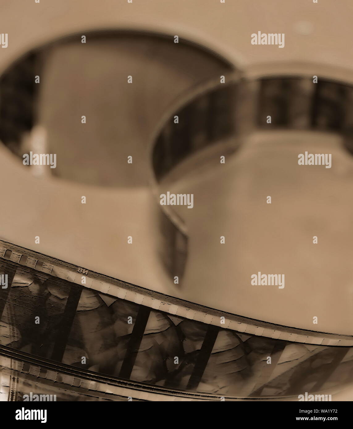 Old cine-film. Film strip on a blur background. Sepia photo Stock Photo ...