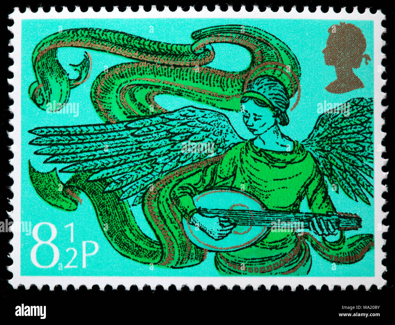Angel with Mandolin, Happy Christmas, postage stamp, UK, 1975 Stock ...