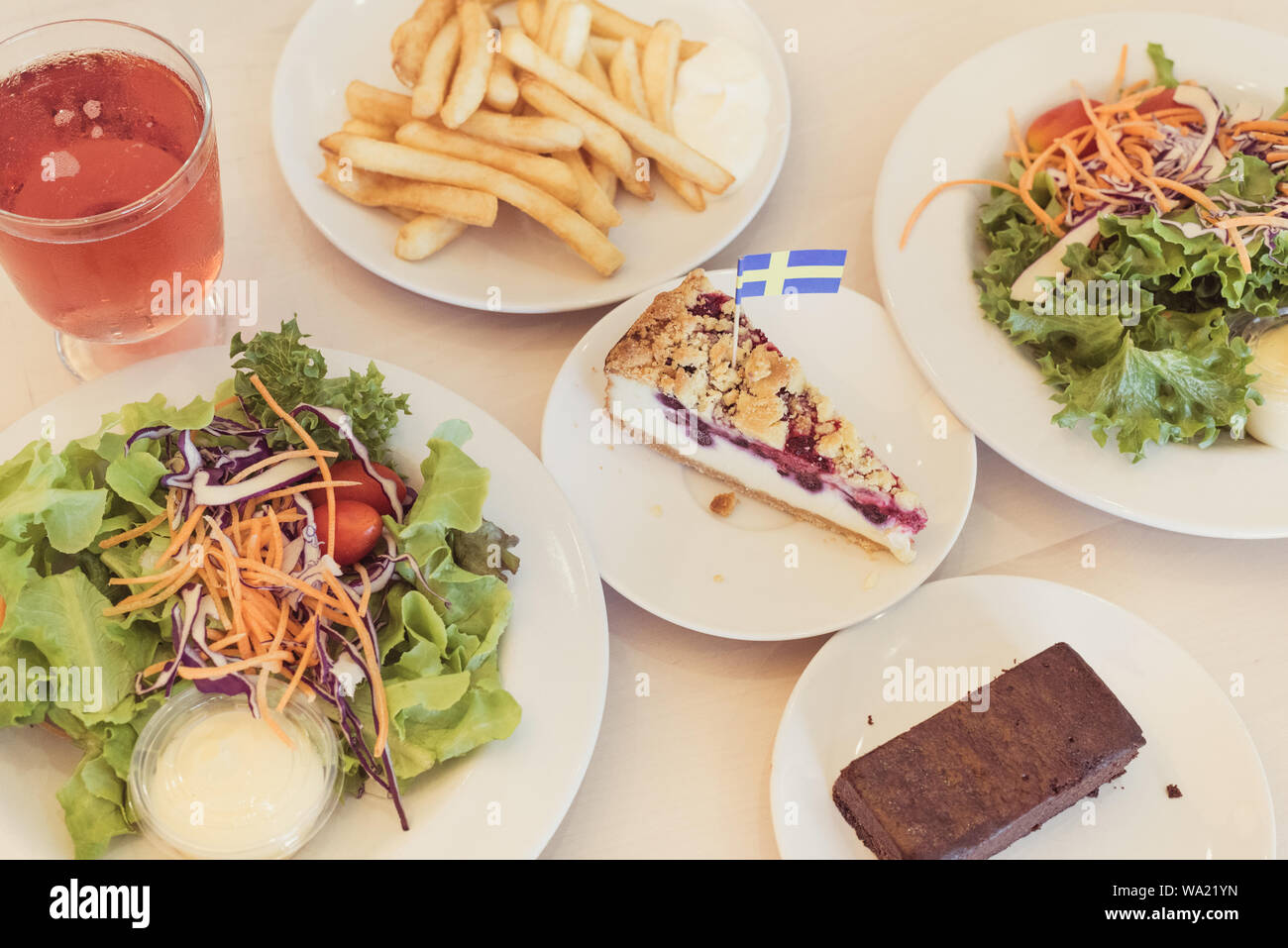 Meal in an IKEA restaurant: a blueberry cheesecake with a Swedish flag ...