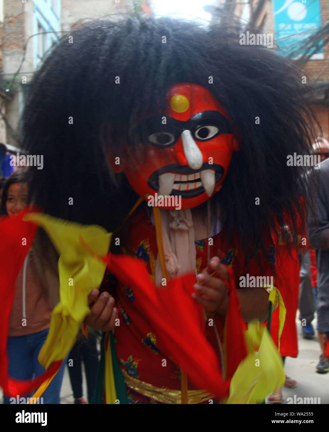 Kathmandu, Nepal. 16th Aug, 2019. A masked dancer(Lakhe) performs in a ...