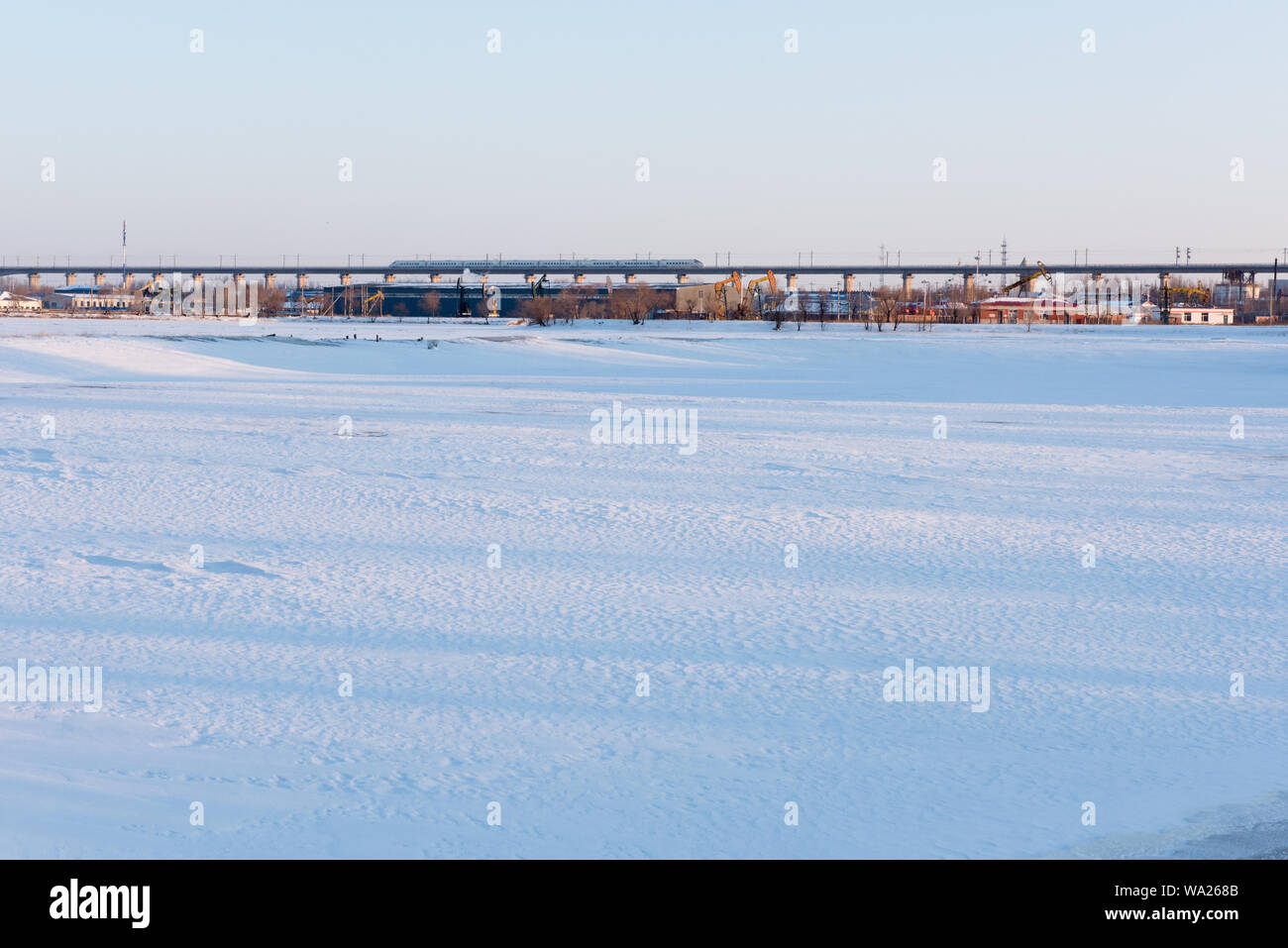 Winter beam pumping unit Stock Photo - Alamy
