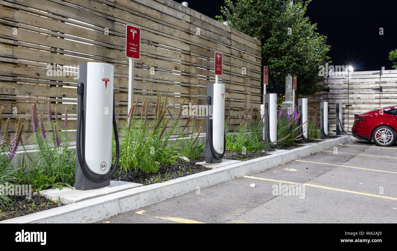 Tesla electric vehicle supercharging station hi-res stock photography ...