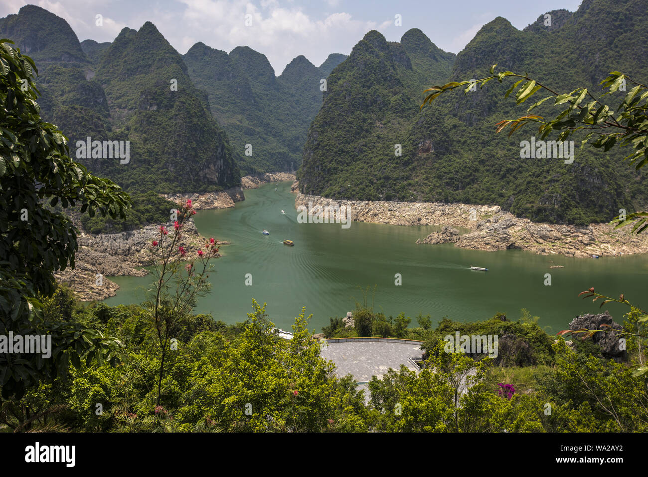 , xingyi, guizhou hoodoo, mountains jade green, rice paddies, ancient ...