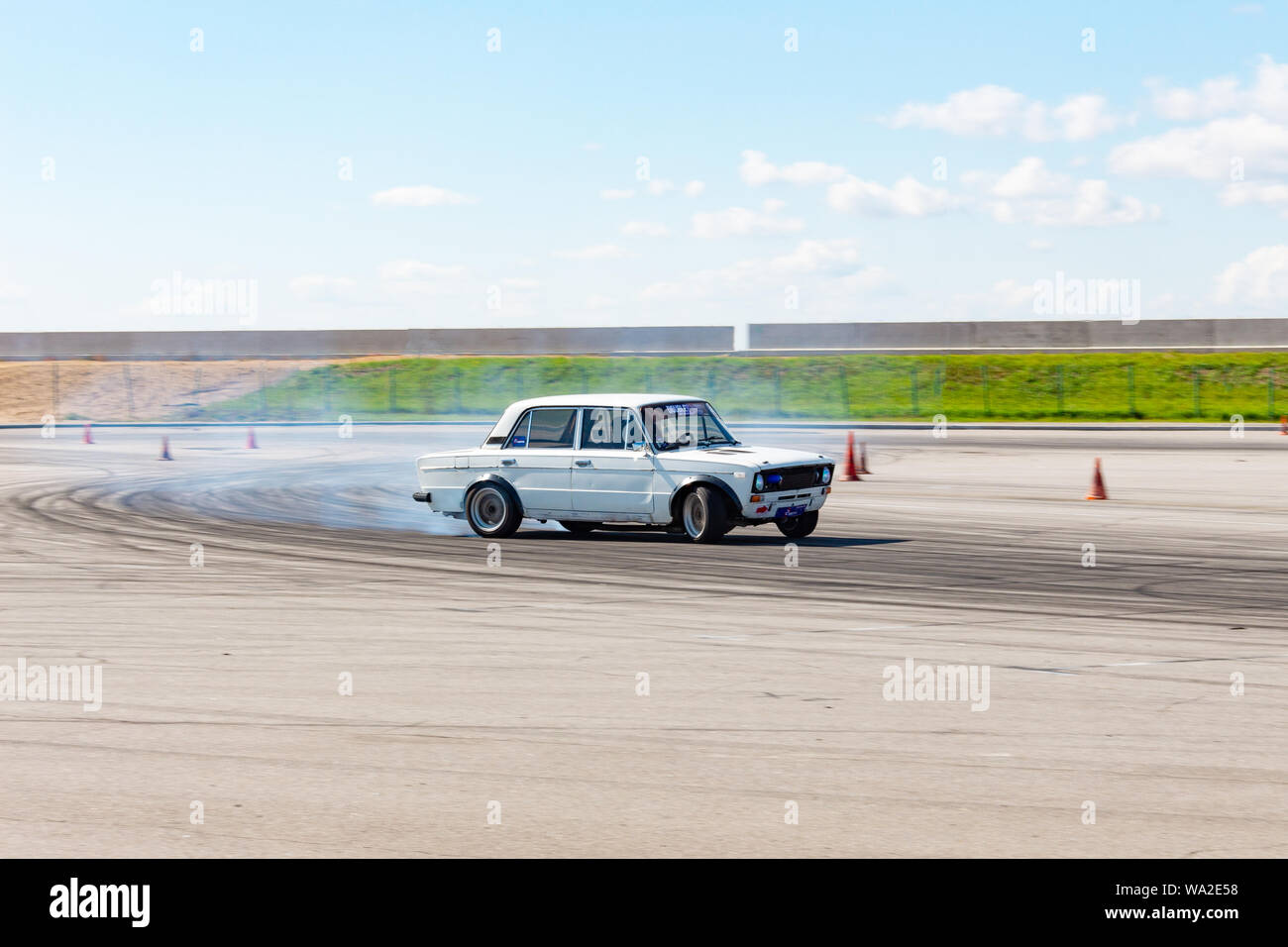 The guy on the car Lada white trains to drift Stock Photo - Alamy