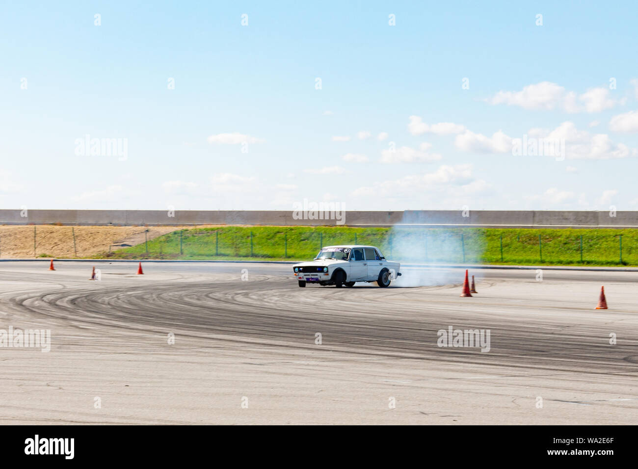 The guy on the car Lada white trains to drift Stock Photo - Alamy