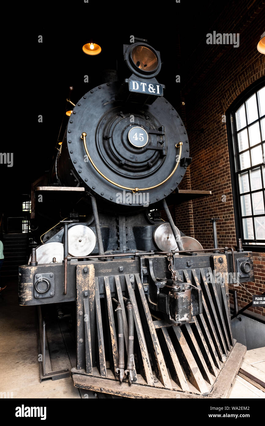 A vintage steam engine locomotive train on display at the roundhouse at ...