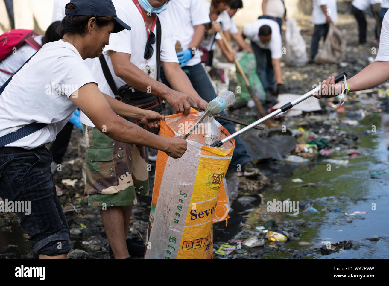 Collecting waste from a river hi-res stock photography and images - Alamy