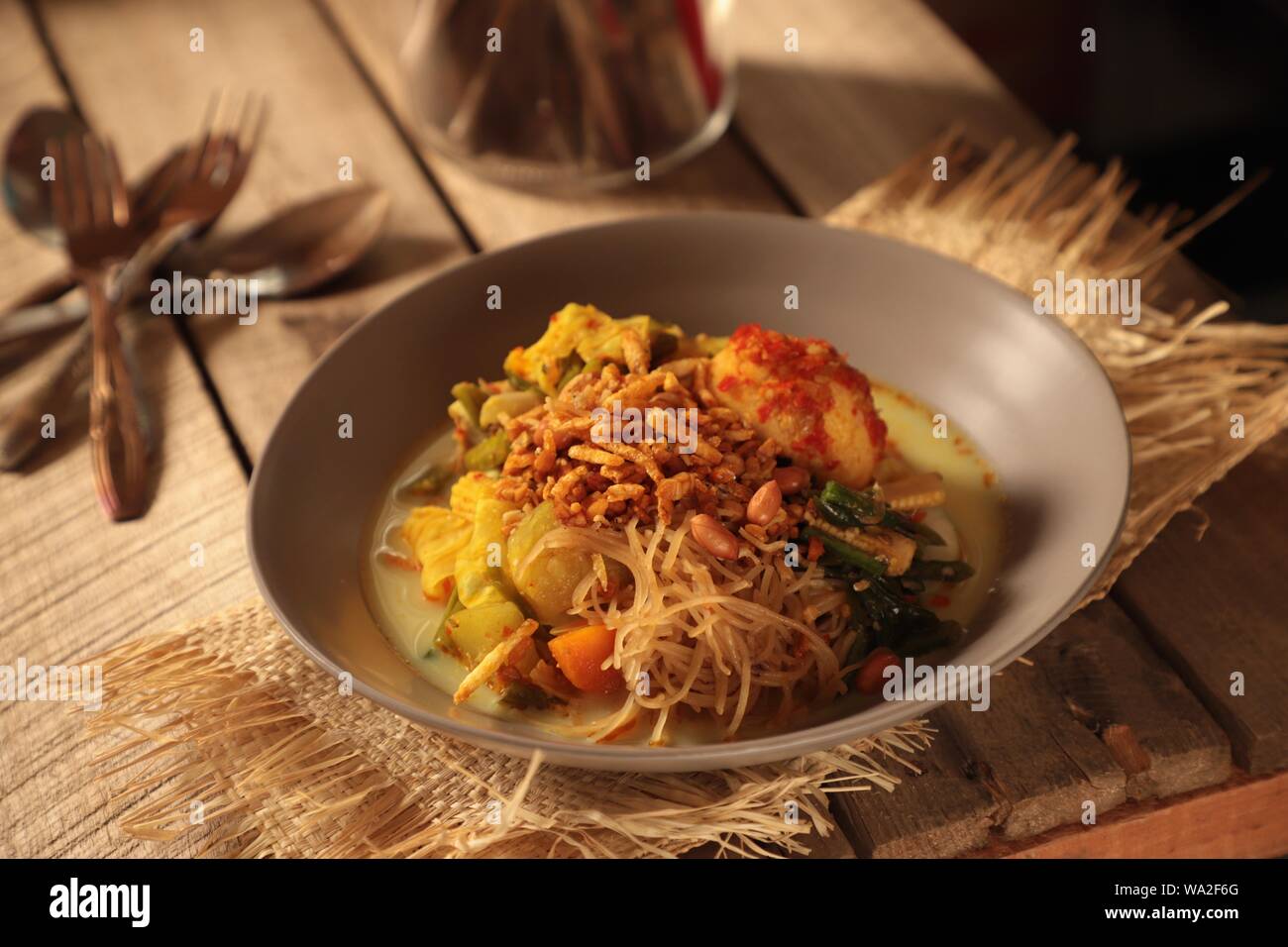 Lontong Sayur Medan. Vegetarian dish of rice cake with egg, vermicelli ...