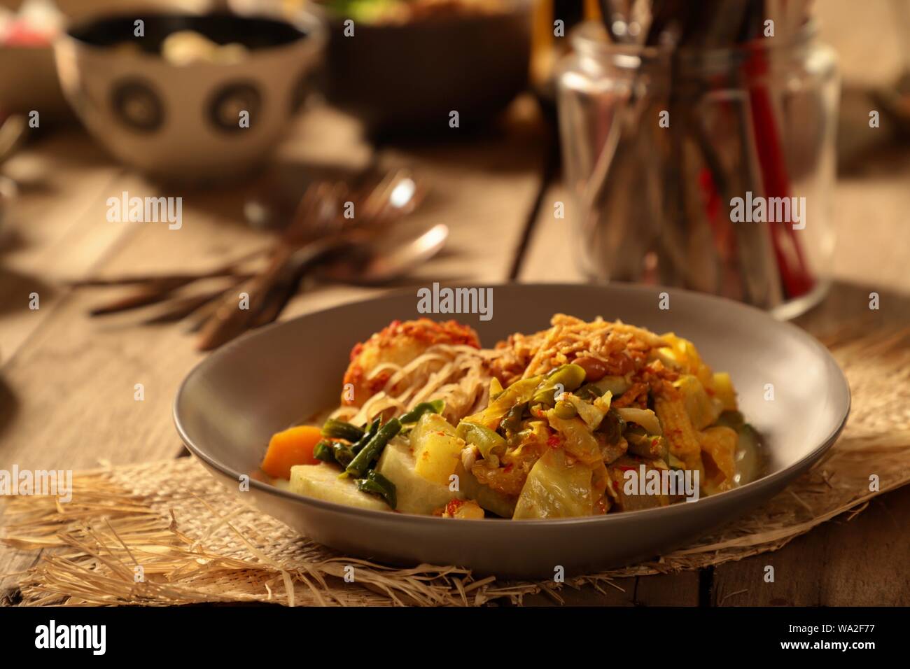 Lontong Sayur Medan. Vegetarian dish of rice cake with egg, vermicelli ...