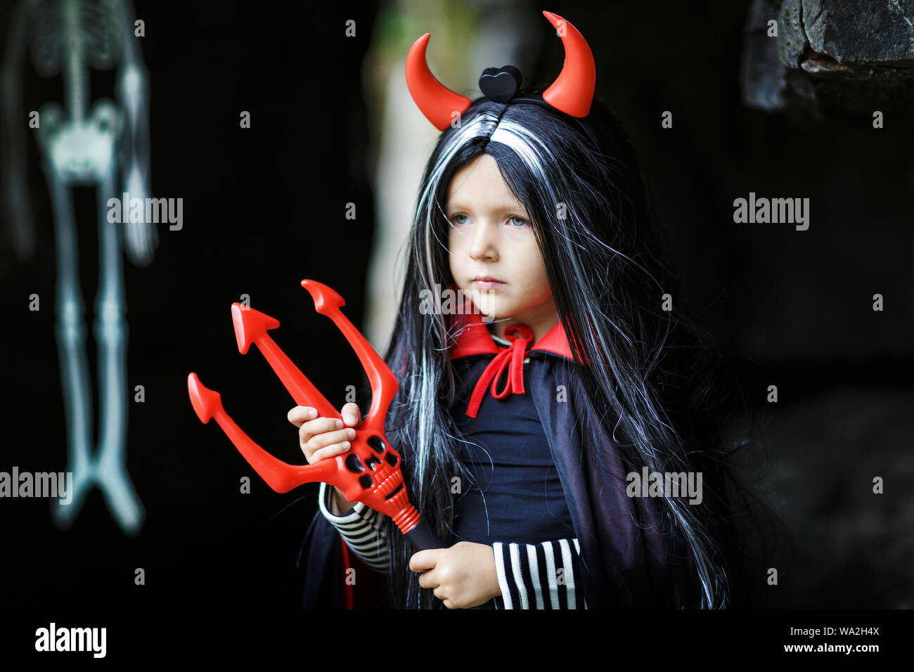 Little Girl with a demon devil costume. Halloween party outdoor Stock ...