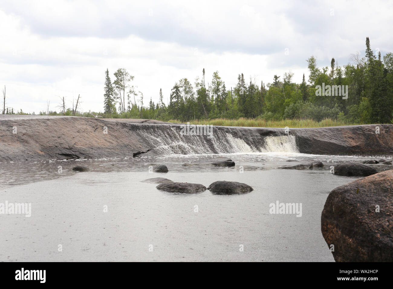 Rainbow Falls Relaxing Time. Canada, Manitoba Stock Photo - Alamy