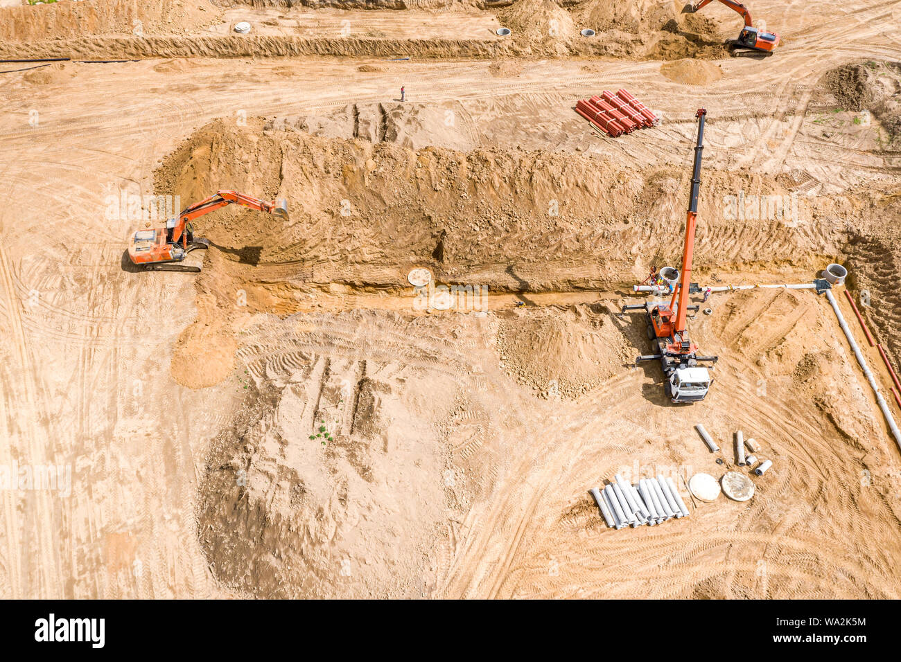 aerial top view of drainage system installation at construction site ...