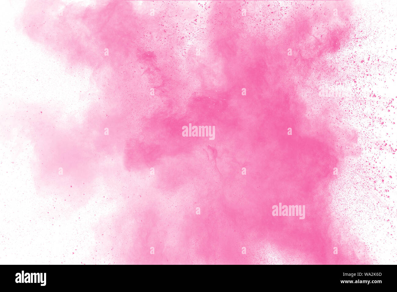 Pink dust particles explosion.Pink powder splatter on white background ...
