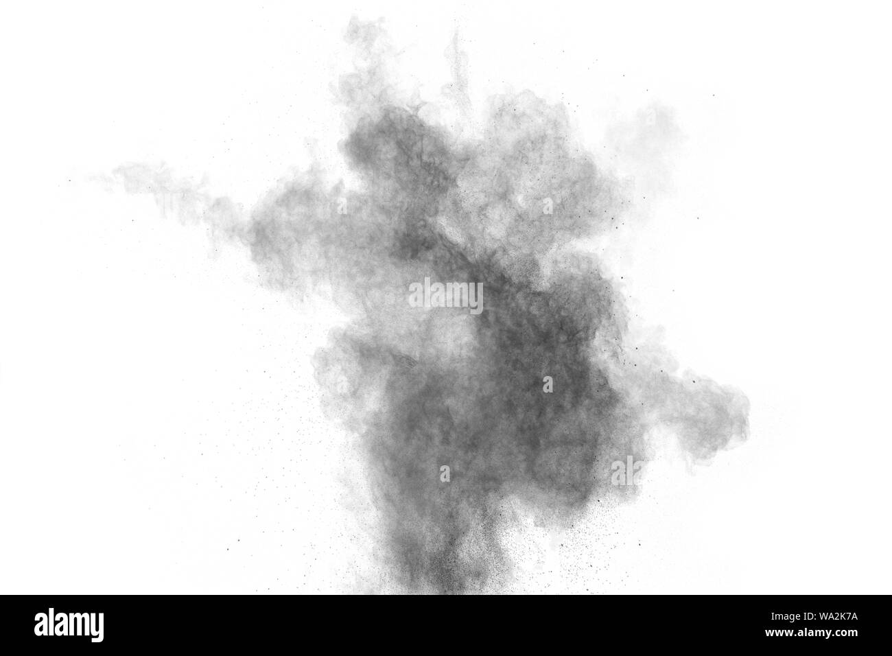 Black particles splatter on white background. Black powder dust ...