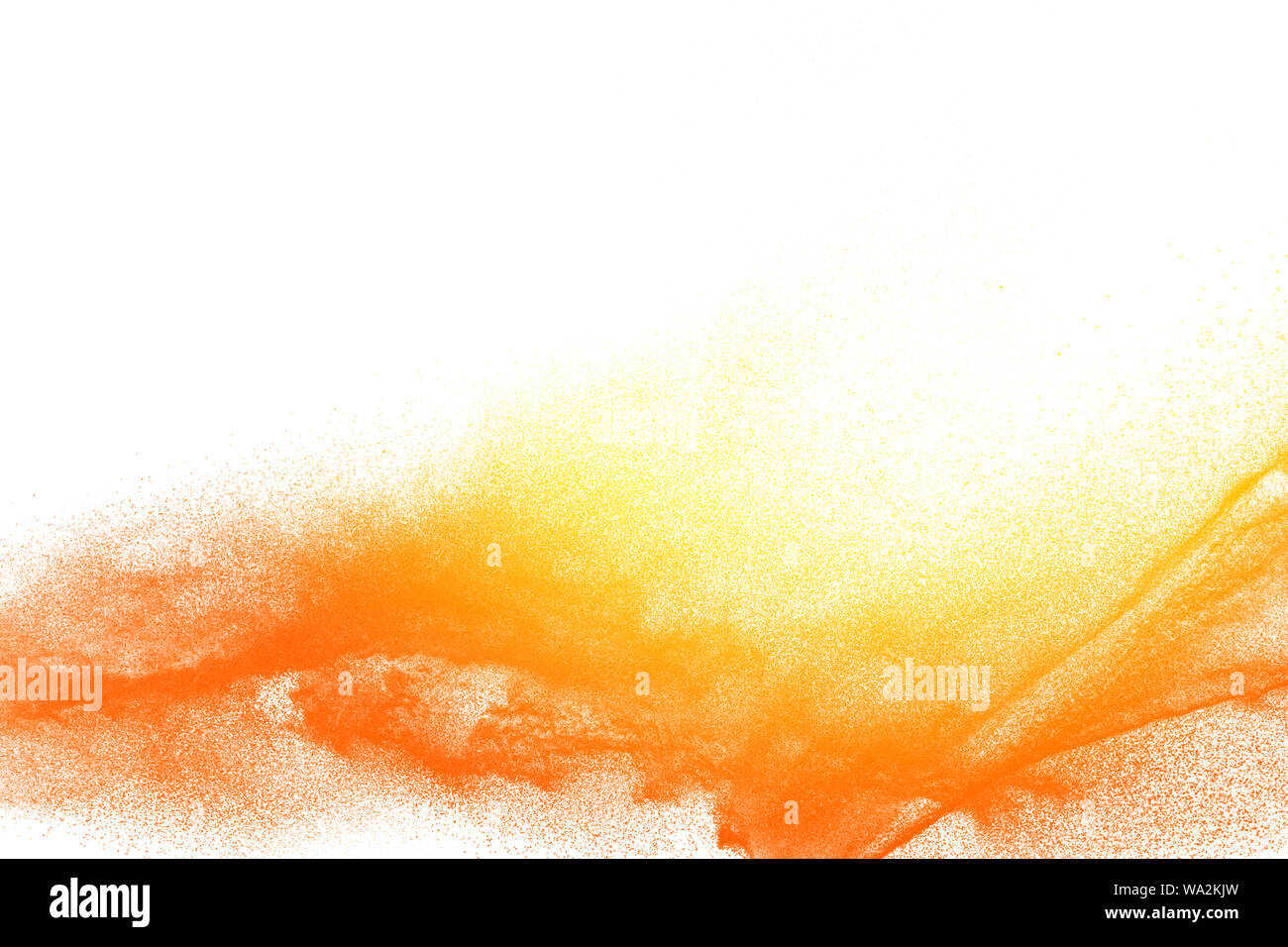 Yellow orange dust particles explosion on white background. Powder dust ...