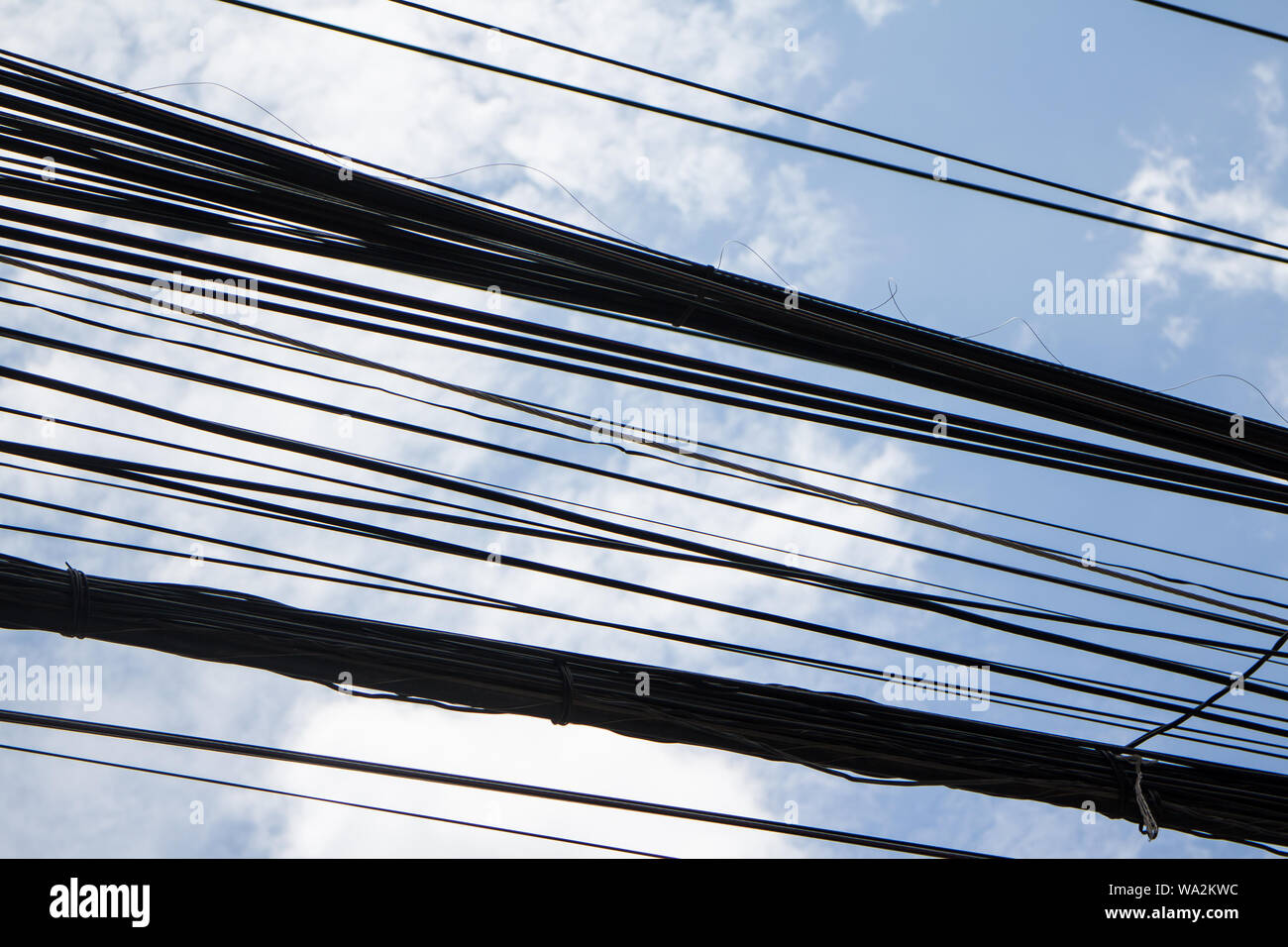 electricity and communication line with cloudy sky background Stock ...