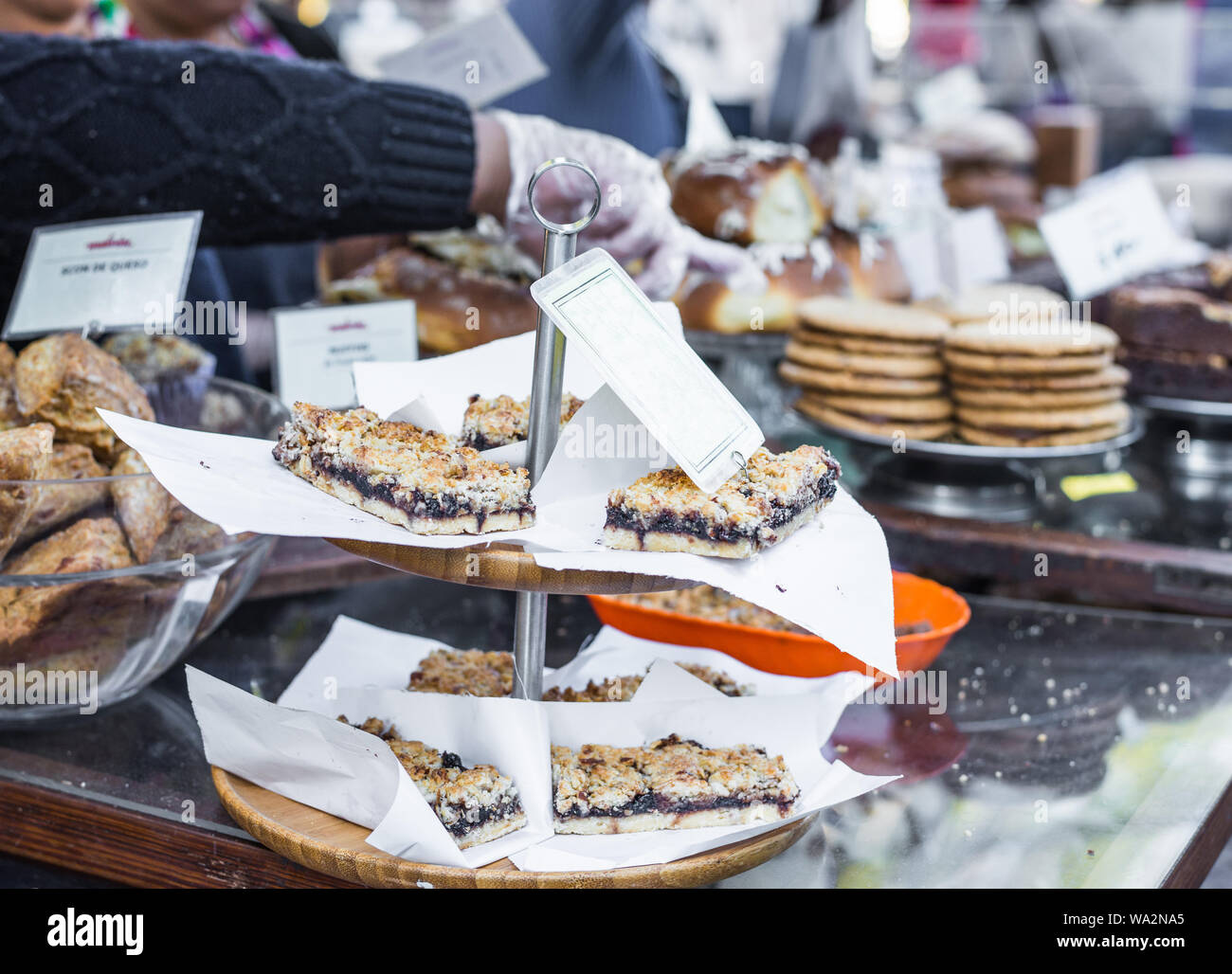 Sweets and desserts at a street food market Stock Photo - Alamy