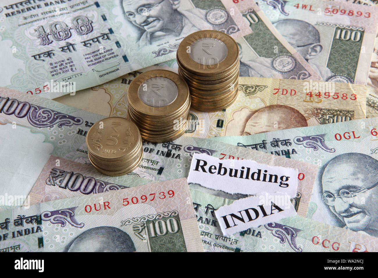 Indian paper currency with labels Rebuilding India Stock Photo - Alamy