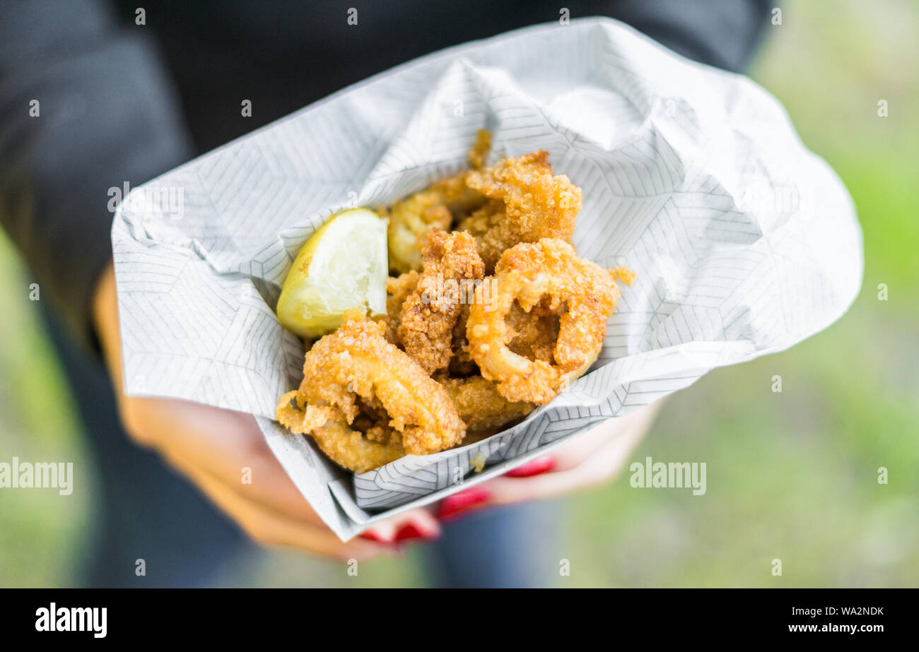 Close up photo of fried squid calamari at a street food market Stock ...